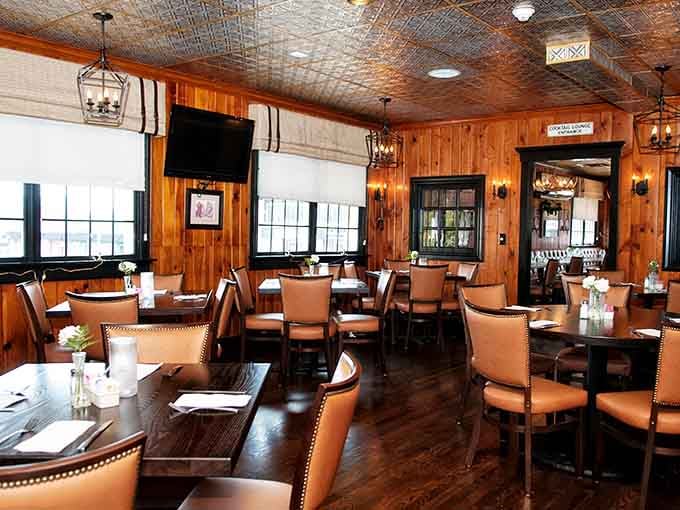 Wood paneling and tin ceilings create that warm tavern atmosphere where everyone feels like a welcomed regular.