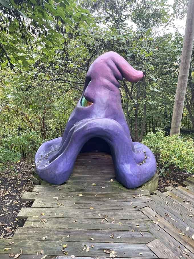The giant purple wizard's hat beckons children to crawl through and emerge transformed, at least in their imaginations and parents' hearts.