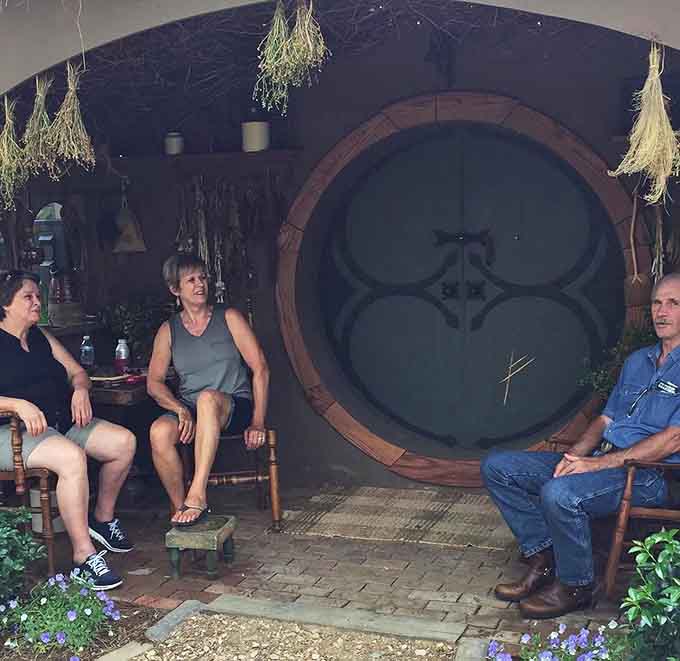 Guests gather outside the famous round door, probably debating who gets to be Frodo for photos.