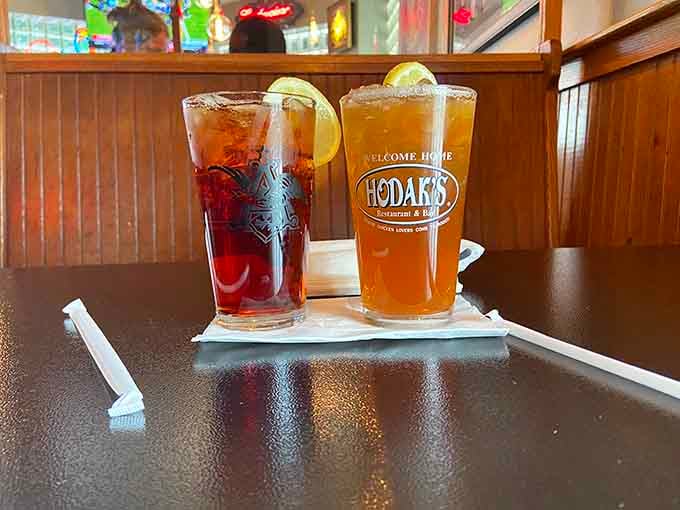 Beverages served in proper glassware because even casual dining deserves a touch of civilized presentation and style.