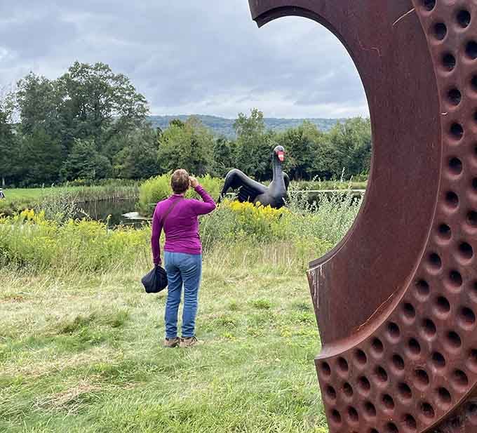 Framed by industrial art, visitors discover that the real masterpiece is the entire surreal landscape before them.