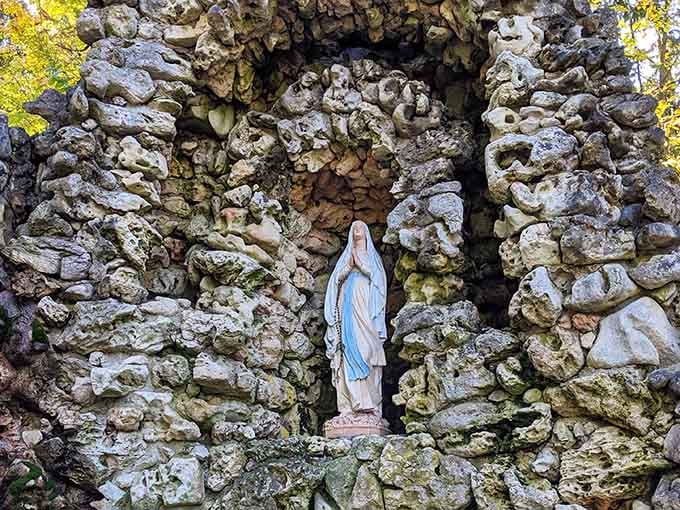Stone grottos dedicated to the Virgin Mary dot the grounds, offering quiet reflection spots throughout your visit.