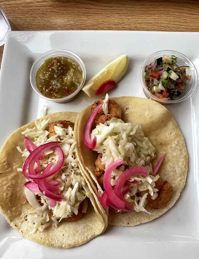 Fish tacos with pickled onions and fresh salsa show this place knows its way around more than crab.