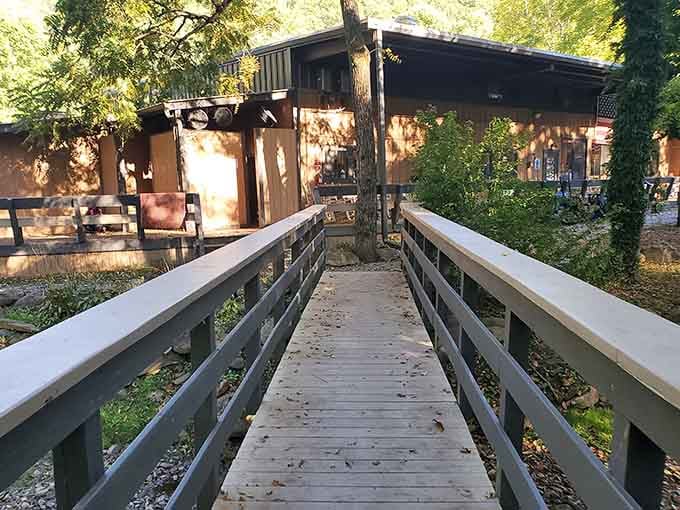 A charming bridge leads to adventure, or at least to the main building for breakfast.