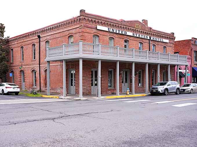 The United States Hotel's brick facade has witnessed more history than most textbooks, and it's still standing tall and proud.