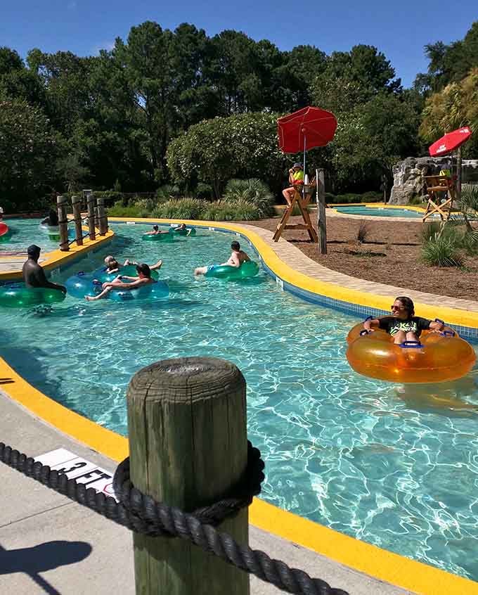 Inner tubes drift lazily along while their passengers perfect the art of doing absolutely nothing productive.