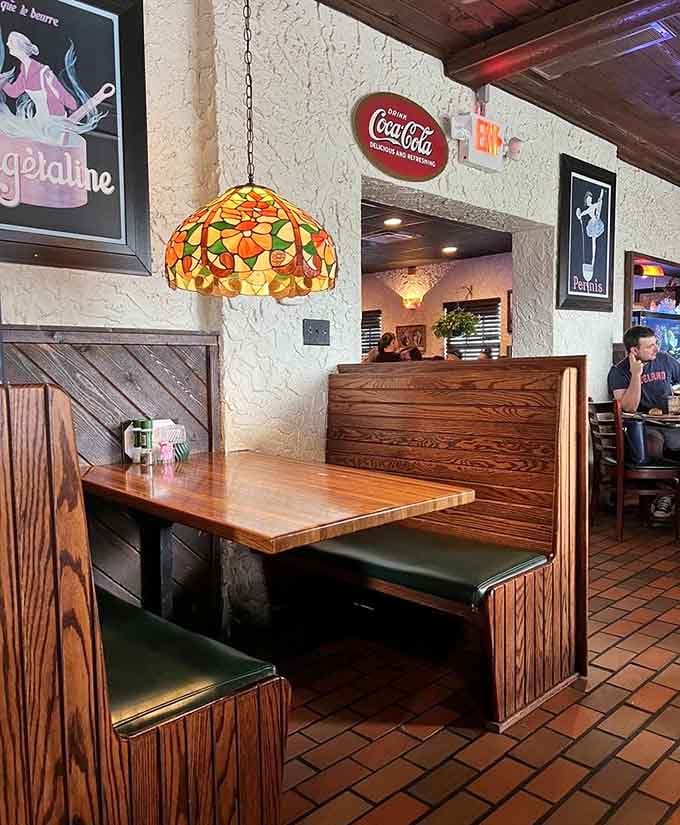 Vintage Coca-Cola signs and Tiffany lamps prove that sometimes retro charm beats modern minimalism every time.