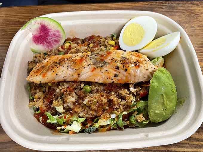 The salmon power bowl where healthy eating doesn't feel like punishment for past delicious sins.