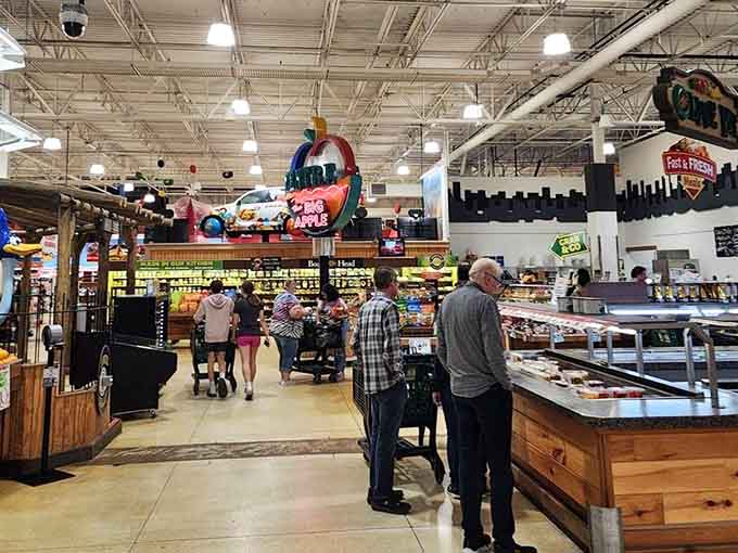 Shoppers wander past themed displays, probably forgetting what they actually came here to buy originally.