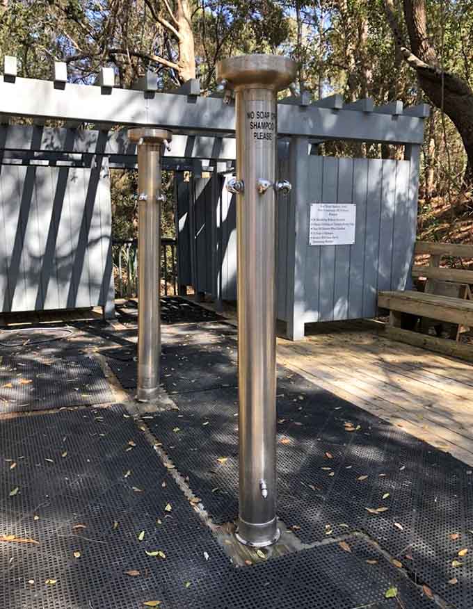 Outdoor showers that actually work well are the unsung heroes of every successful beach day you've ever had.