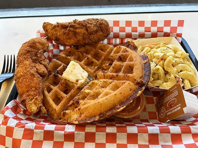 Crispy chicken meets fluffy waffle with butter and syrup in a combination that never gets old or boring.