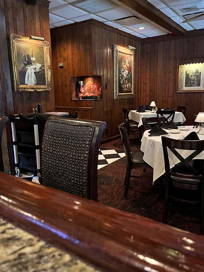 Wood paneling and classic artwork transport you to an era when steakhouses knew how to set the mood.