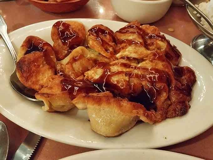 Fried wontons achieve that golden crispiness that makes you forget every diet you've ever considered starting tomorrow.