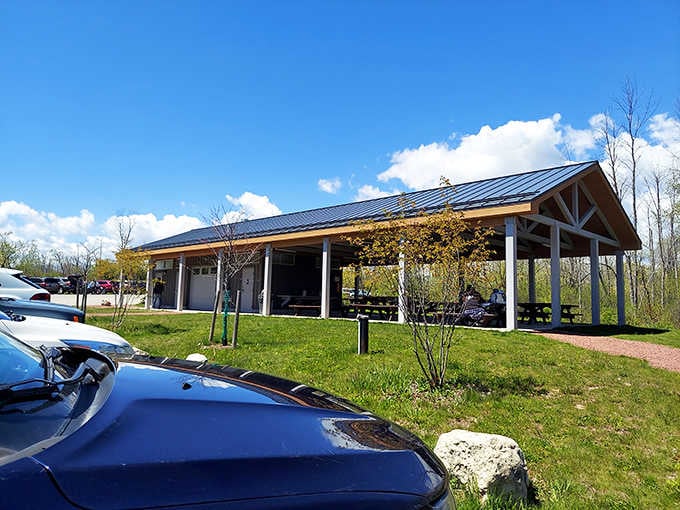 That pavilion offers shelter and picnic spots, because even nature lovers need somewhere to enjoy their sandwiches properly.