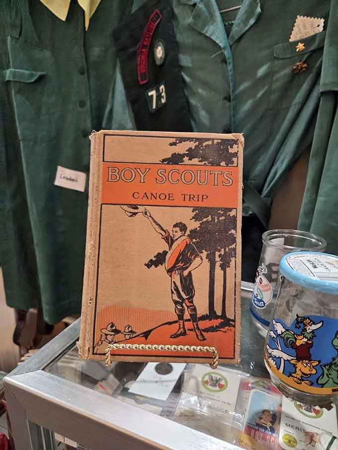 A Boy Scout handbook from when outdoor skills meant actual survival, not just Instagram photo opportunities.