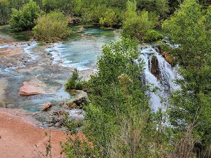Multiple cascades tumbling through the canyon create nature's version of a water park, minus the overpriced snacks.