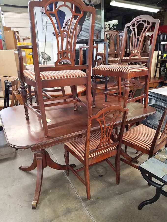 This dining set's striped chairs are giving serious vintage vibes without the vintage boutique price tag attached.