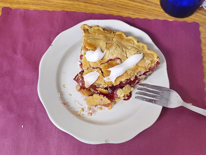 Strawberry rhubarb pie with lattice crust that looks like grandma's handiwork, tastes even better than it looks.