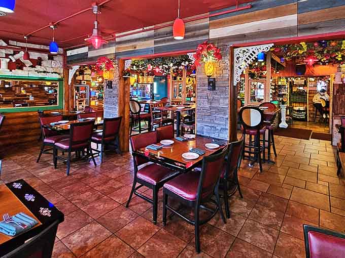 Another angle of the whimsical interior that proves sometimes the most colorful restaurants serve the most memorable meals in town.