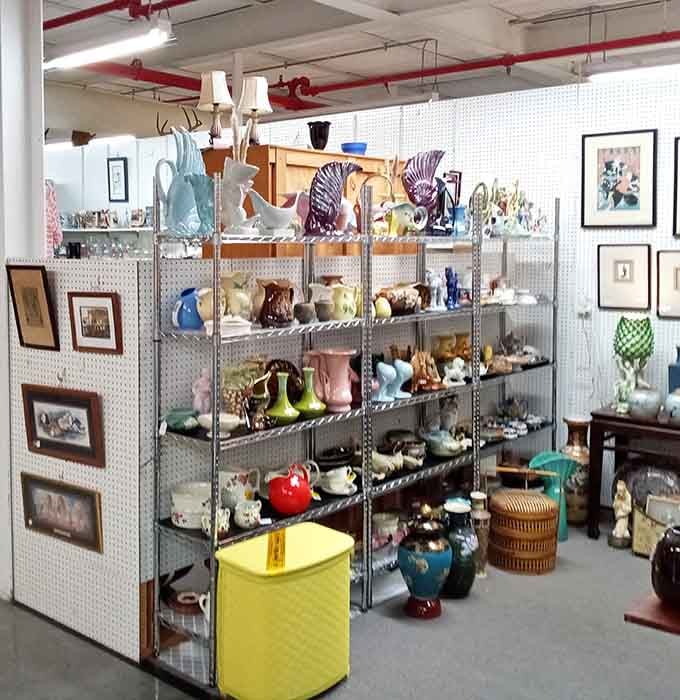 Ceramic vases and glass treasures create a kaleidoscope of colors that would make any decorator weep with joy.