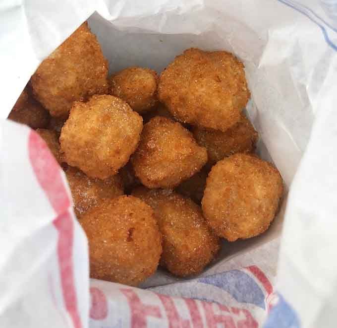 Golden cheese nuggets that crunch on the outside and stretch deliciously on the inside, like tiny edible treasures.