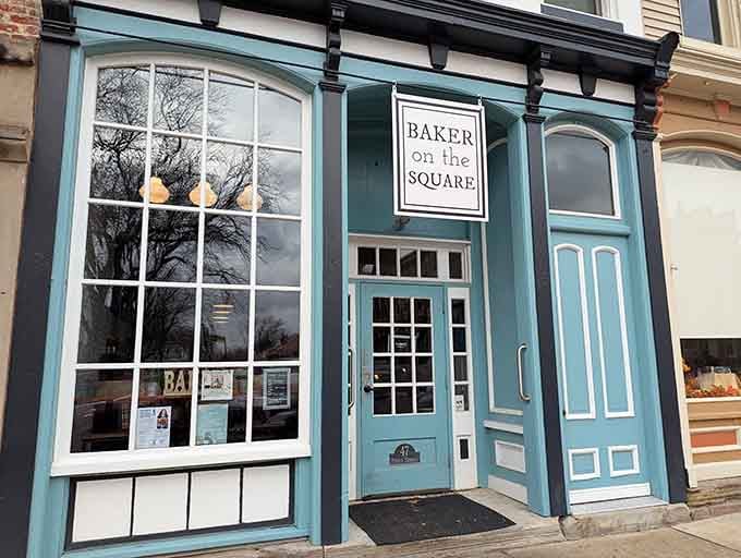 Baker on the Square beckons from its charming turquoise storefront. Those windows practically whisper promises of fresh-baked goodness waiting inside.