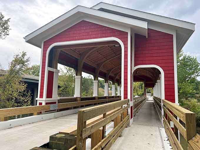 The covered bridge adds old-fashioned charm, proving this park has style beyond its adrenaline-pumping main attraction.