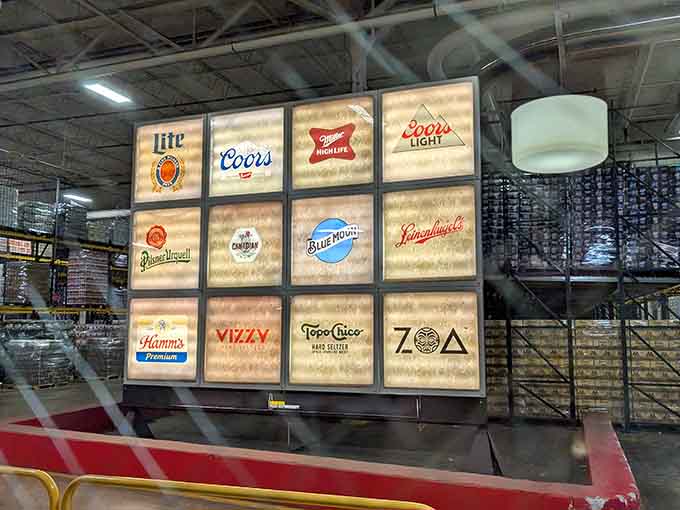 This illuminated wall showcases the family of brews, each logo telling its own delicious story.