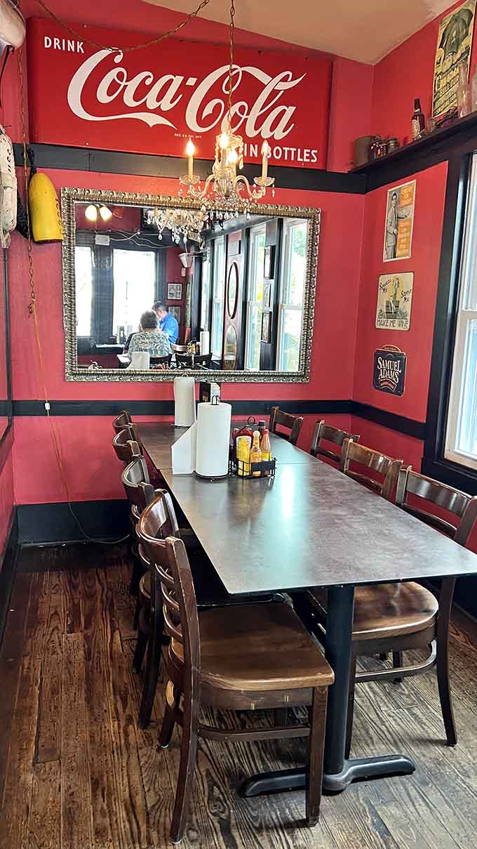 Vintage Coca-Cola signs and a chandelier create the kind of quirky ambiance you can't fake or buy wholesale.