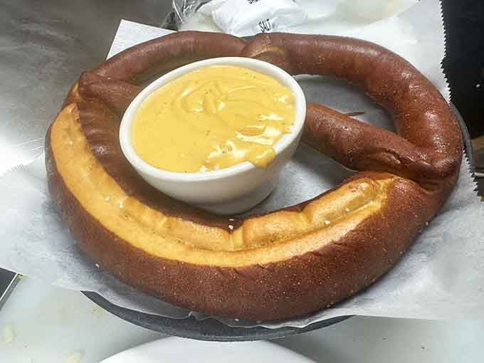 A soft pretzel the size of a small planet, served with a bowl of golden beer cheese. Yes, please.