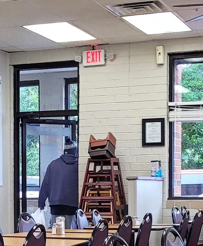 High chairs stacked by the exit prove families know where to find food that satisfies every generation.