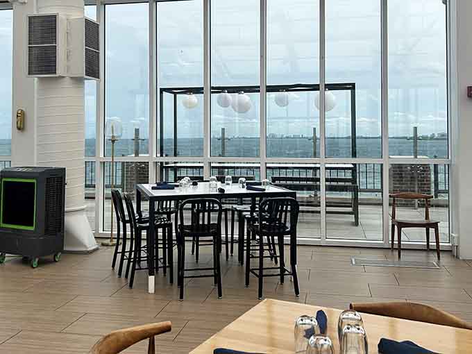 Clean lines, comfortable seating, and those windows opening to the breeze&mdash;this is rooftop dining done absolutely right.