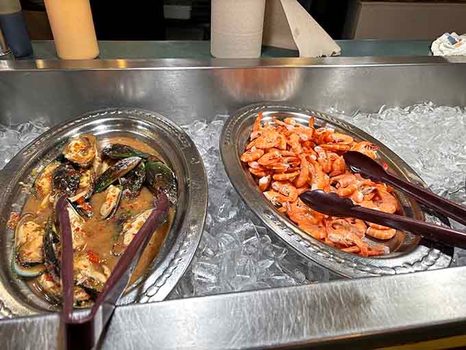 Mussels and shrimp rest on ice, looking fresher than they have any right to at these prices.