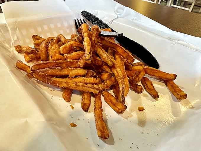 Golden sweet potato fries, crispy enough to stand at attention before you devour them completely.