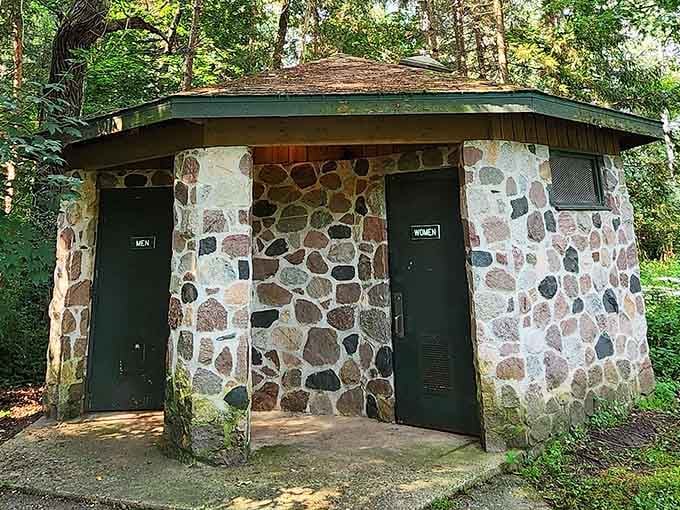 These charming stone restrooms blend so well with the landscape, they're practically part of the natural architecture.