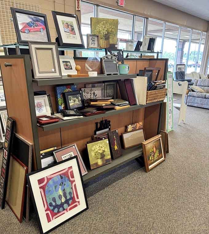 Framed art and photos stacked like a gallery waiting to happen, ready to fill those bare walls you've been ignoring.