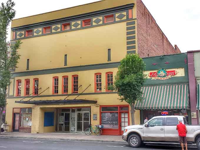 The Rivoli Theatre's colorful facade adds a splash of entertainment history to downtown's architectural tapestry.