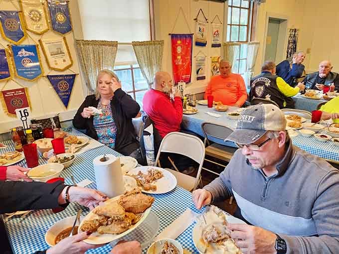 Community dining at its finest, where strangers become friends over shared platters of the world's best comfort food.