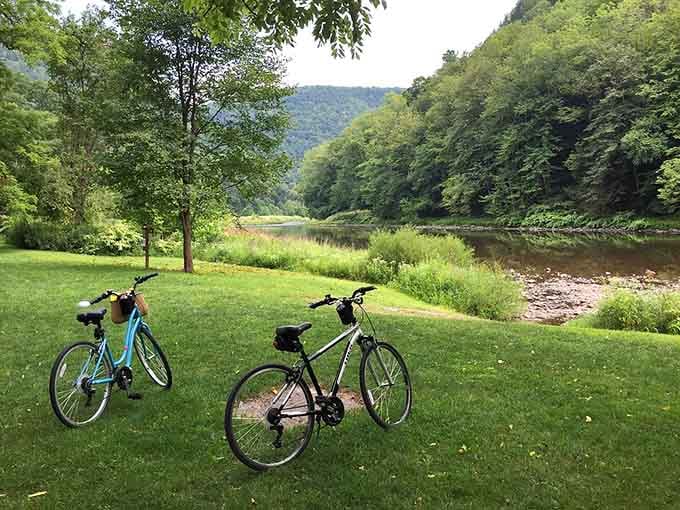 Two bikes resting creekside, their riders presumably off discovering why this trail is legendary among Pennsylvania cyclists.