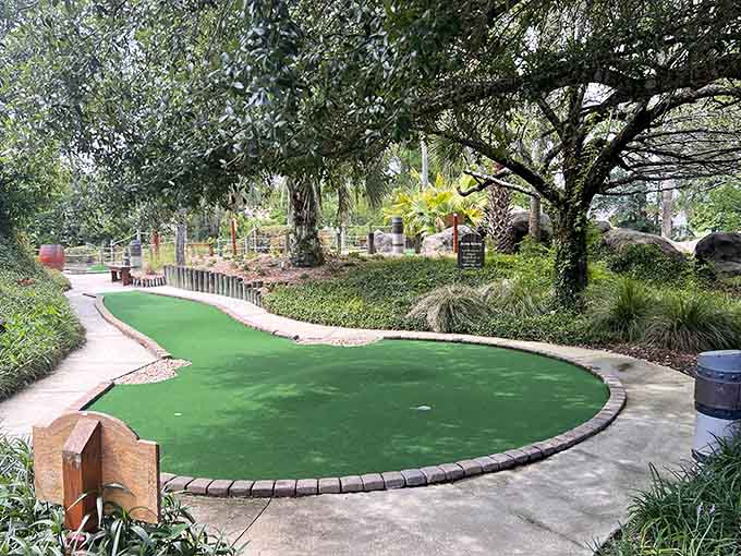 Shaded by ancient oaks, this putting green offers respite from the Alabama sun between your championship shots.