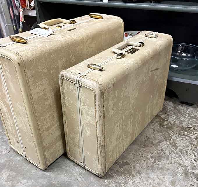 Vintage suitcases that traveled the world before TSA existed, now ready to become your most interesting home decor.