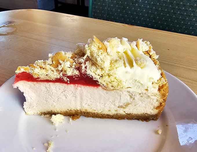 Creamy cheesecake with a delicate strawberry topping offers the perfect sweet ending to your retro feast.