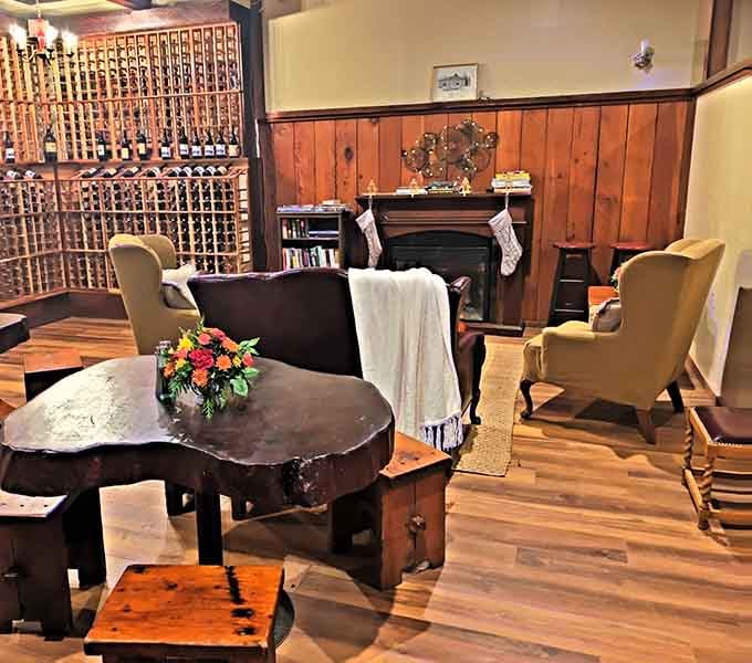Cozy seating areas with wine racks and comfortable chairs&mdash;because great meals deserve equally great atmospheres to enjoy them.