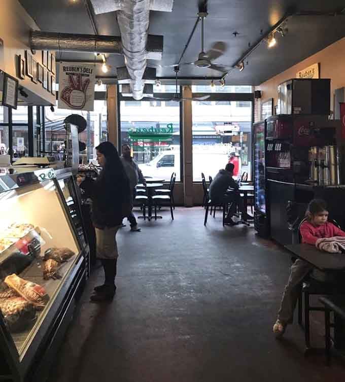 Sunlight streams through those big windows, illuminating the path between ordering and pure sandwich-induced bliss ahead.