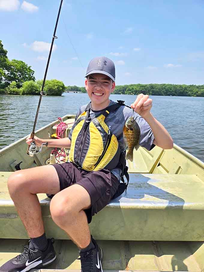 That grin says it all: bluegill caught, bragging rights earned, and proof that patience sometimes pays off beautifully.
