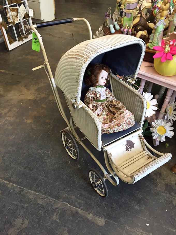 Even vintage baby carriages find new life here, complete with their own tiny passengers from decades past.