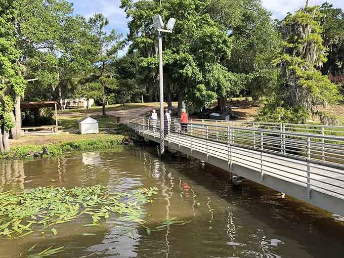 A footbridge connecting island life to the mainland, though most residents prefer their boats and the independence they provide.