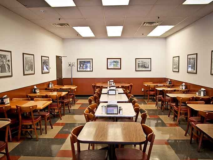 Black and white photos on the walls whisper stories of decades spent feeding Indianapolis one sandwich at a time.