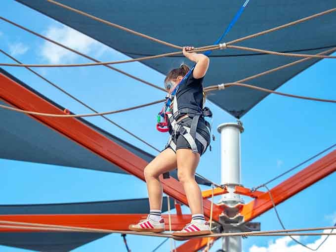 The high-ropes obstacle course adds another dimension of challenge for those who prefer their thrills above water level.