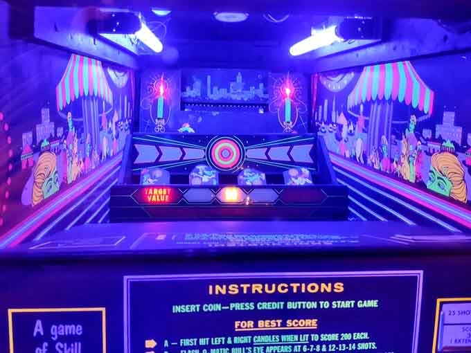 This shooting gallery game glows like a neon fever dream, inviting you to test your aim and patience.